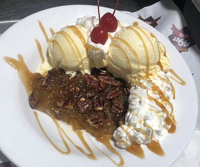 Pecan pie that doesn't just end your meal &ndash; it provides closure with a sweet epilogue of vanilla ice cream and caramel drizzle worthy of a standing ovation.