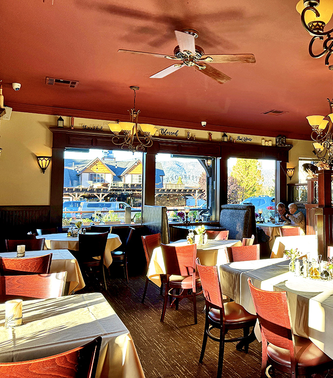 Inside Peppercorn Grille, warm lighting and white tablecloths create the perfect backdrop for vacation splurges and romantic dinners.