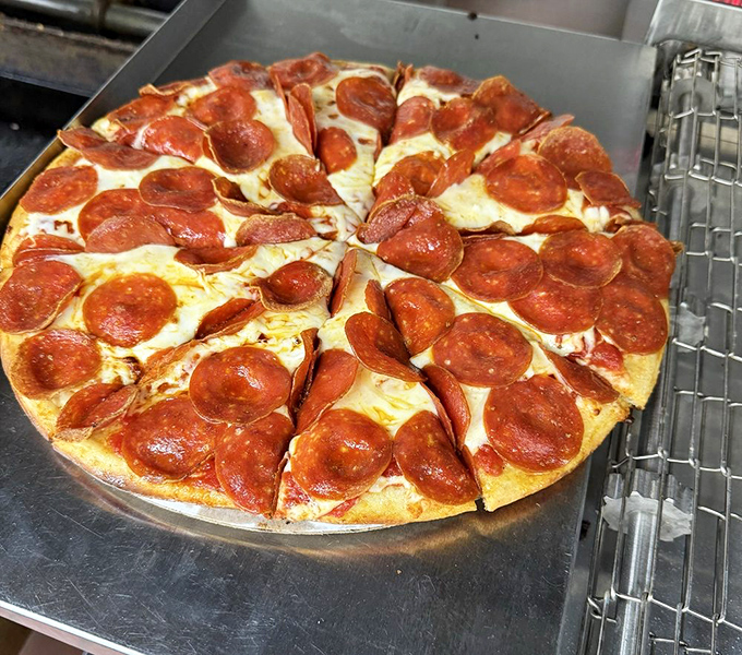 Pizza perfection in its most honest form &ndash; a disc of melty cheese and perfectly crisped pepperoni that needs no gourmet description.