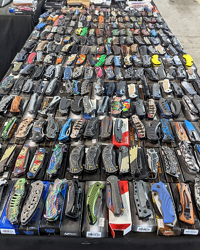 Pocket knife nirvana! This dazzling display of folding functionality would make any outdoorsman, collector, or gadget enthusiast weak at the knees.