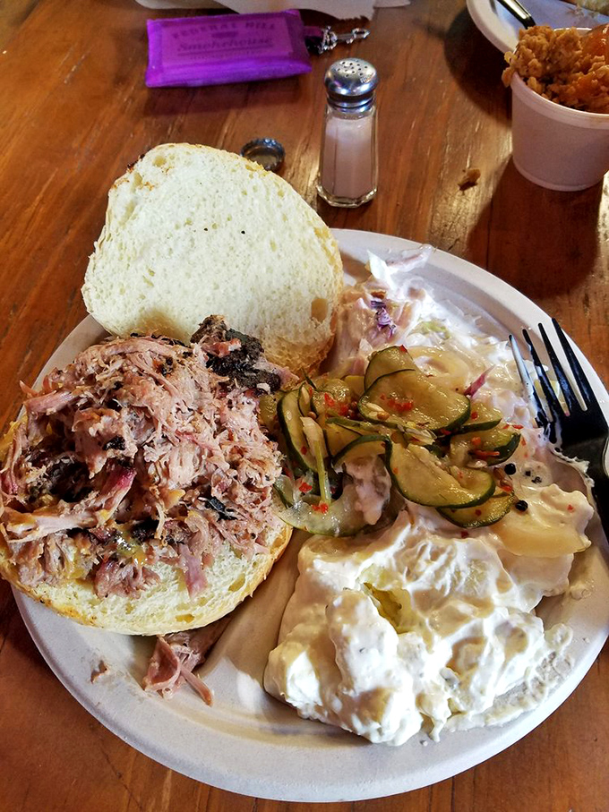 A pulled pork sandwich that doesn't hide behind fancy toppings&mdash;just perfectly smoked meat on a bun, ready to transport you to barbecue nirvana.