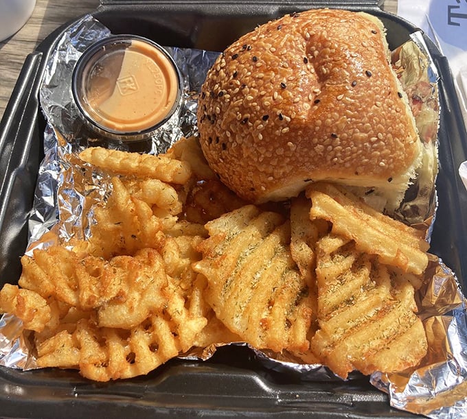 A sandwich that demands to be the center of attention, with waffle fries that aren't just sides&mdash;they're supporting actors worthy of their own spin-off.