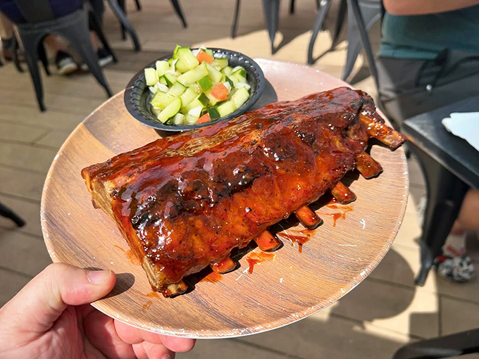 Barbecue ribs glazed to perfection demonstrate that Dock's mastery extends beyond their seafood specialties.