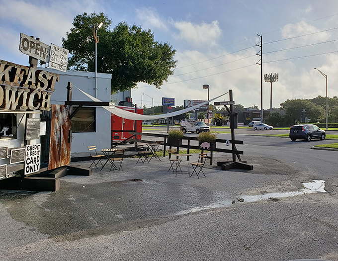 Roadside revelation - where breakfast pilgrims gather in a humble parking lot that transforms into sacred culinary ground before noon.