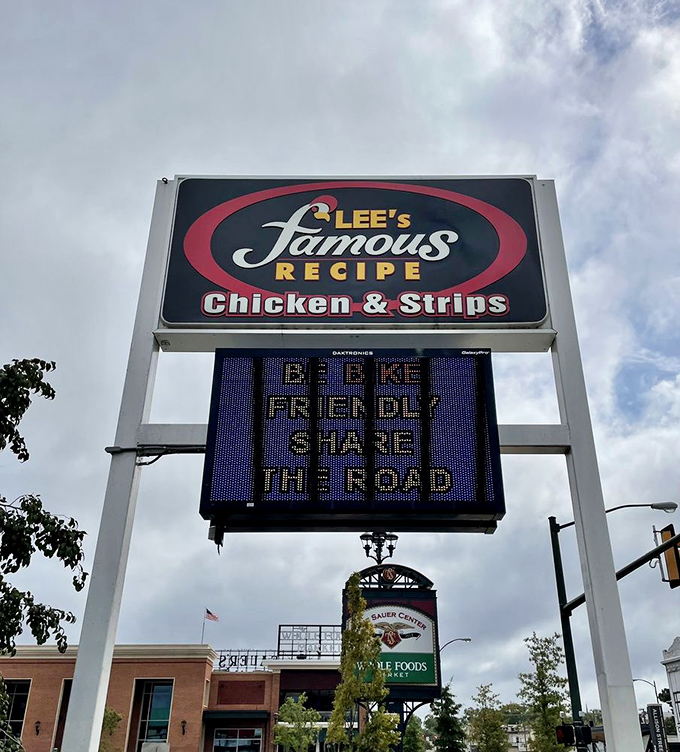"Be kind, share the food"—sage advice from a sign that understands the primal urge to hoard all the chicken for yourself.