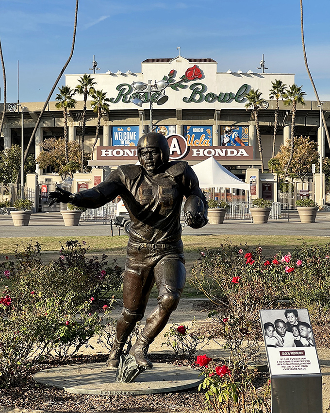 Even football legends stand guard outside this treasure trove, silently judging those who leave without making at least one impulse purchase.