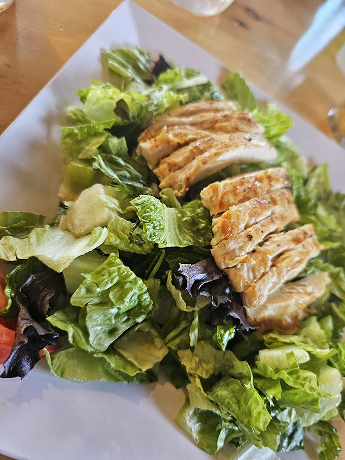 A fresh salad topped with perfectly grilled chicken offers a lighter option that doesn't sacrifice flavor &ndash; because balance is important when you're saving room for fish.