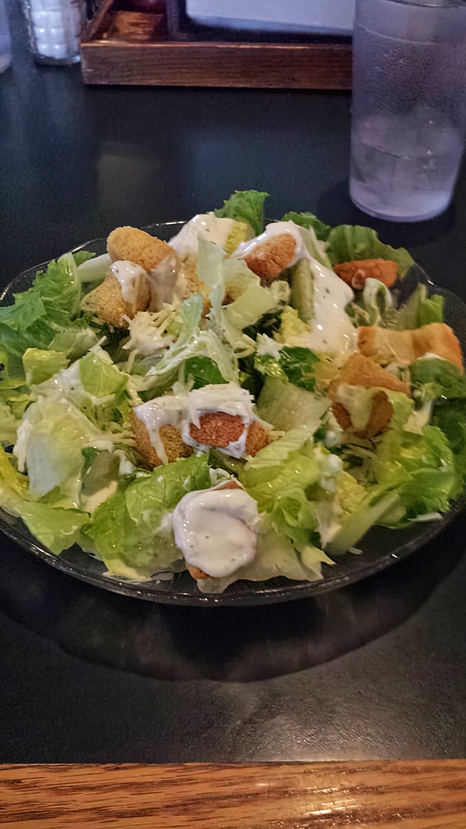 A fresh salad for those who want to pretend they're eating healthy before demolishing a butter burger. We see you, and we respect the strategy.