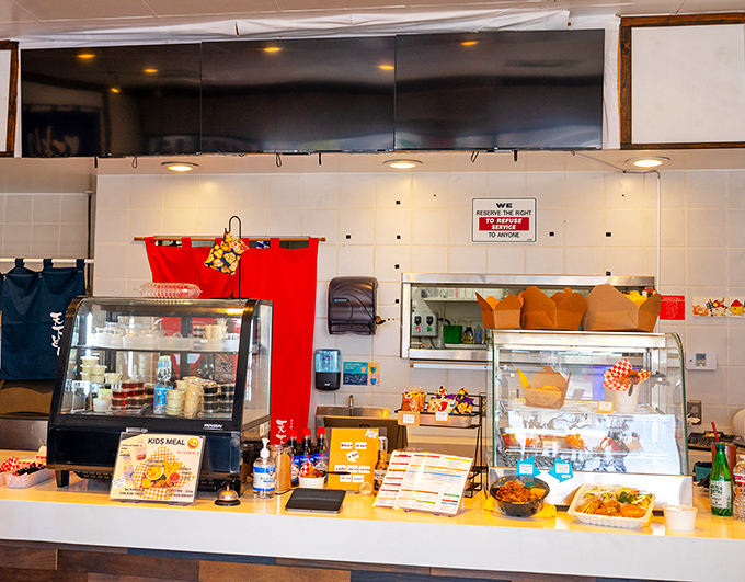 A display case of sauces and to-go items that tempts you to bring the Tenkatori experience home. Resistance is futile; your future self will thank you.