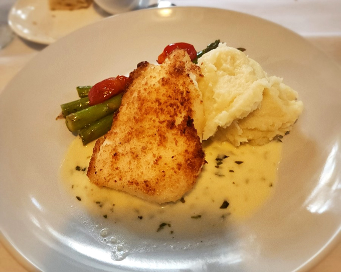 Sea bass so perfectly cooked it practically levitates. Those mashed potatoes are the unsung heroes of this plate-licking masterpiece.