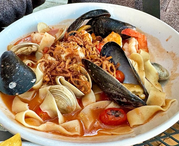 Seafood pappardelle that would make Neptune himself request seconds. Those mussels and shrimp nestled among ribbons of pasta deserve a standing ovation.