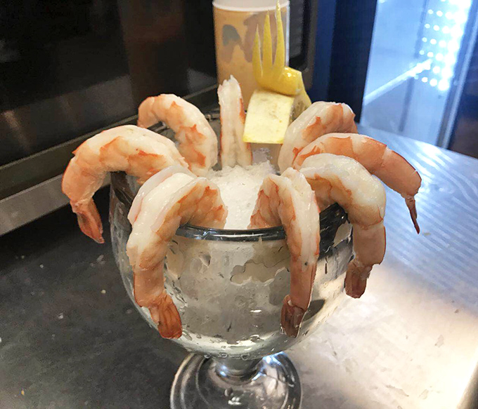 Shrimp cocktail reimagined as a crown fit for Neptune himself. Those plump crustaceans perched on the rim aren't just appetizers&mdash;they're sentinels guarding a frosty treasure. 