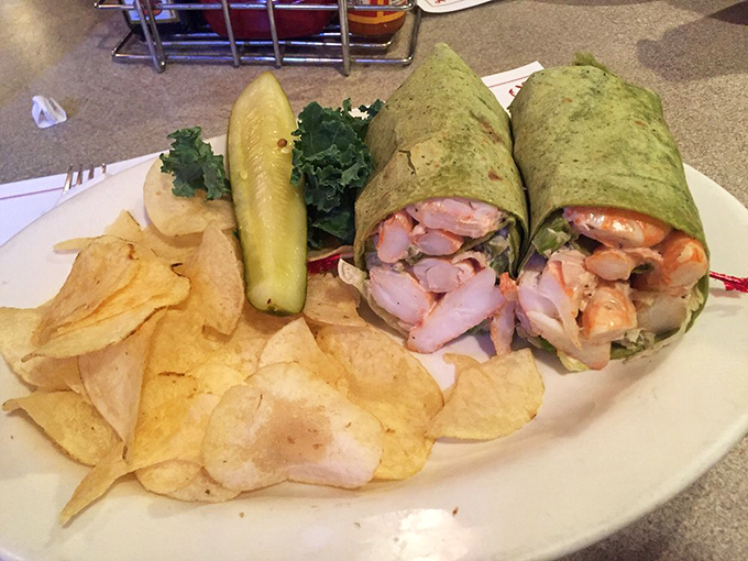 A shrimp salad wrap that brings the bay to lunch hour. Portable seafood perfection with just the right amount of creamy indulgence.