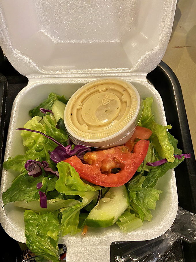 Even the side salad gets respect here&mdash;crisp, fresh, and colorful, it's the supporting actor that deserves its own award.