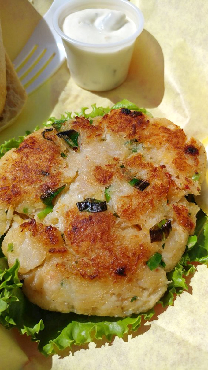 This crab cake isn't just a side&mdash;it's the main event that got mislabeled. Perfectly browned with visible chunks of crab that remind you what matters most.