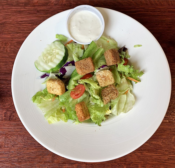 Even the side salad gets special attention &ndash; a fresh, crisp counterpoint to balance all that glorious barbecue indulgence.