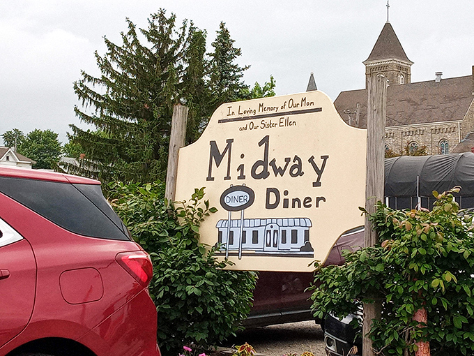 More than just a sign&mdash;it's a landmark that promises good food and better company, standing sentinel outside this beloved local institution.