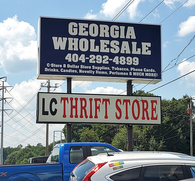 The roadside sign announces LC Thrift Store's presence – a beacon for bargain hunters traveling Delaware's highways in search of secondhand gold.
