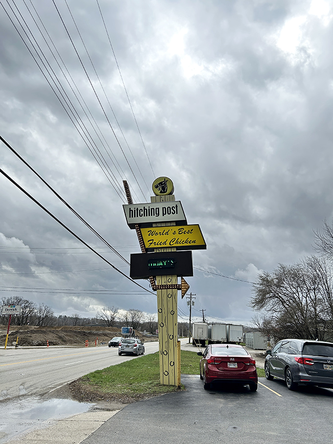 The beacon that guides hungry travelers. This vintage sign has pointed countless chicken pilgrims to their crispy, golden destination.