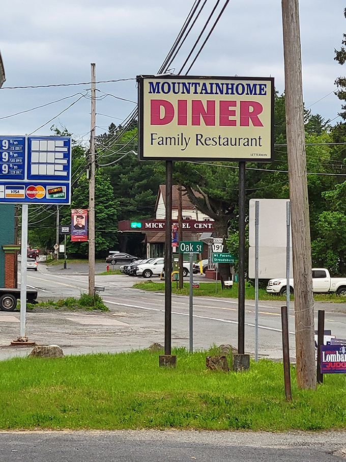 The roadside sign stands as a beacon for hungry travelers. "Mountainhome Diner" isn't just a name&mdash;it's a promise of comfort food in the heart of the Poconos.