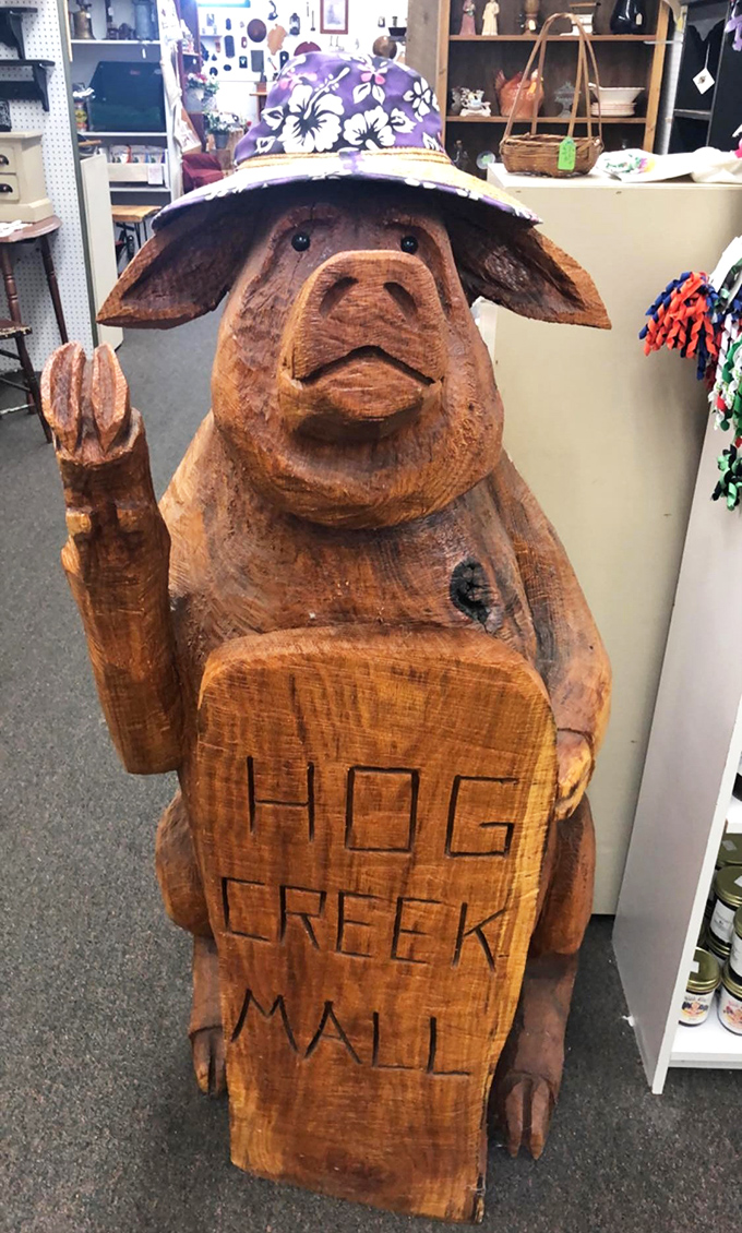 The unofficial greeter of Hog Creek&mdash;a wooden pig with more personality than most reality TV stars and a hat that's surprisingly fashion-forward.