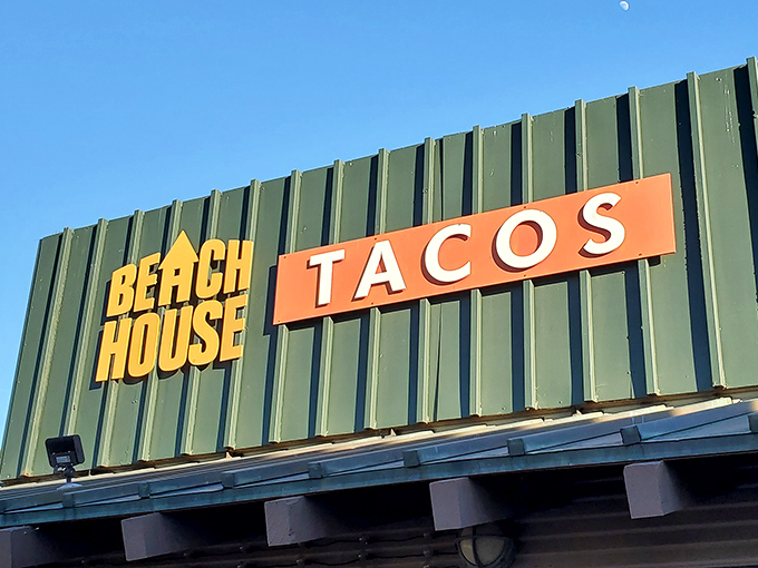 The sign glows like a beacon against the blue California sky, calling to hungry souls like a siren song of tortillas.