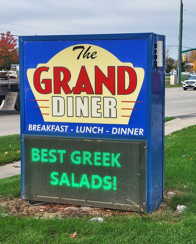 The roadside sign doesn't just advertise&mdash;it beckons. And those Greek salads must be something special to earn electronic billboard status.