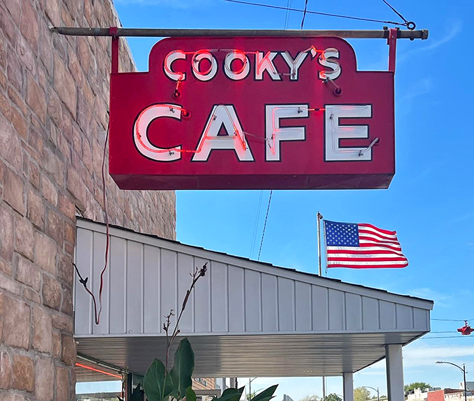 That neon-red sign has guided hungry travelers through Missouri nights like a beacon of hope promising hot coffee and homemade pie at journey's end.