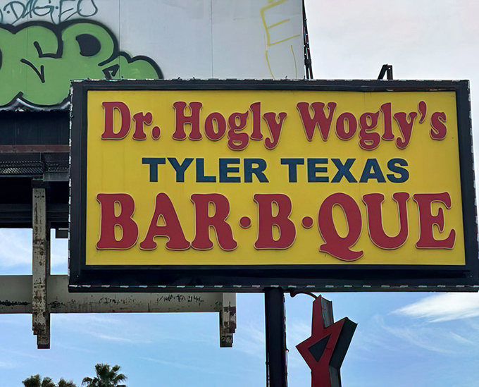 The yellow sign shines like a beacon of BBQ hope in a world of mediocre fast food. Dr. Hogly Wogly prescribes smoked meat for what ails you.