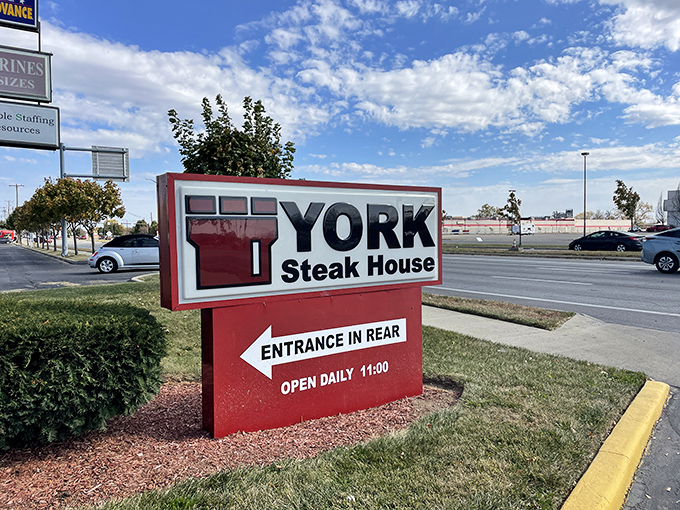 The roadside sign stands as a beacon of hope for hungry travelers and locals alike&mdash;follow the arrow to satisfaction.