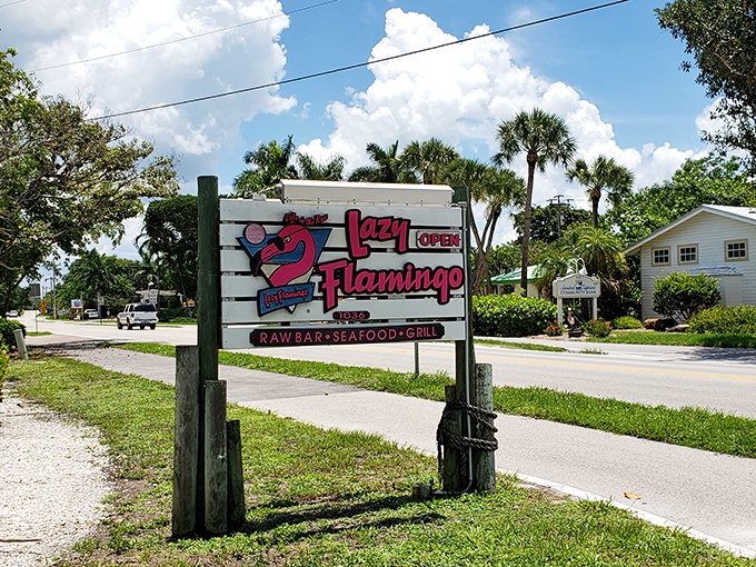 Your beacon to brilliant bites! This roadside sign is the culinary lighthouse guiding hungry travelers to seafood salvation.