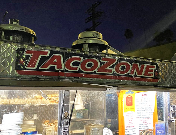 The iconic red lettering promises not just tacos, but an experience—a true Los Angeles landmark that's more culturally significant than many museums.
