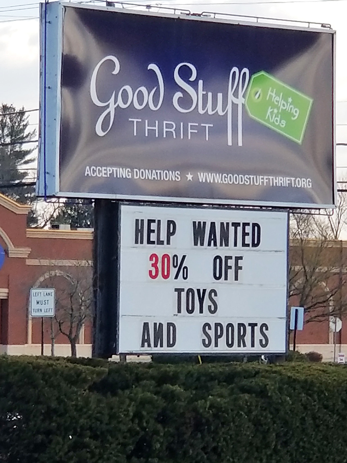 The roadside sign announces more than just a store&mdash;it's a beacon for bargain hunters and a reminder that shopping here helps kids.