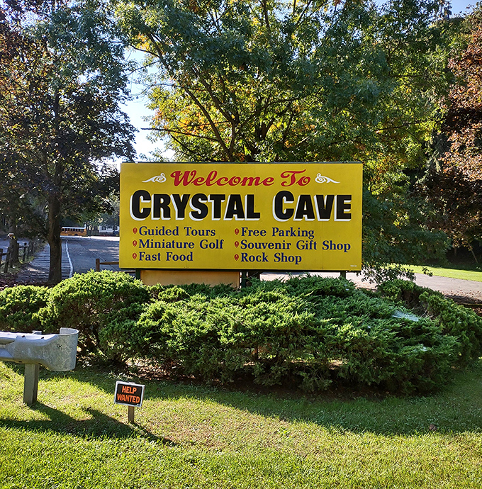 The welcoming sign promises guided tours and miniature golf &ndash; because why choose between underground wonders and surface fun?