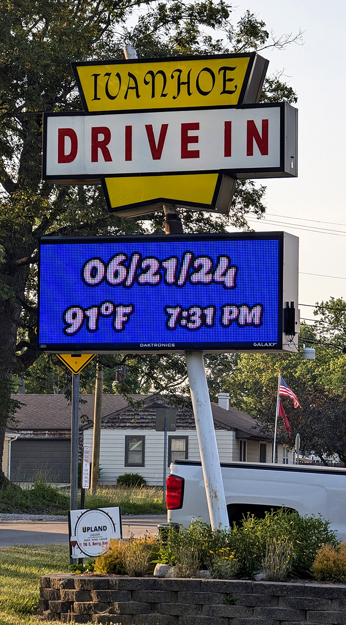 The iconic yellow sign stands as a beacon of hope for dessert lovers, promising sweet salvation just ahead.