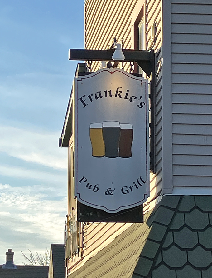 The sign says it all&mdash;three perfect glasses of beer promising exactly what you'll find inside: honest food, good drinks, and zero pretension. 
