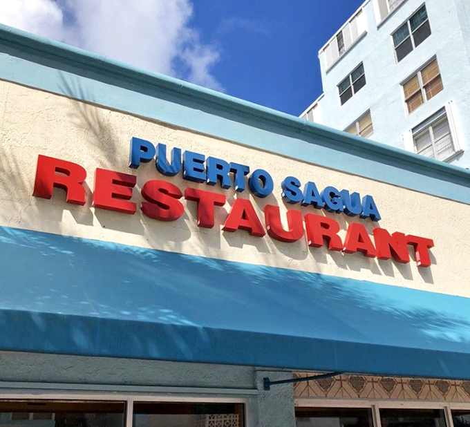 The restaurant's name blazes in red and blue against Miami's perpetual sunshine&mdash;a beacon of authenticity in a sea of trendy pretenders.