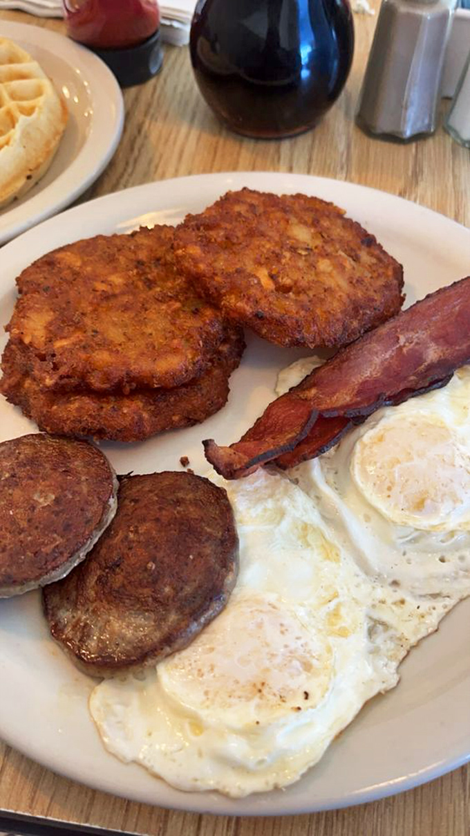 The breakfast plate that answers the eternal question: "Why choose one protein when you can have them all?" Morning ambition on a plate.