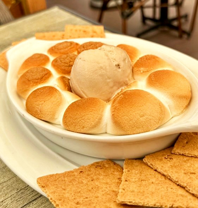 S'mores reimagined for grown-ups who don't want to smell like campfire. The toasted marshmallow crown is practically begging for your spoon.