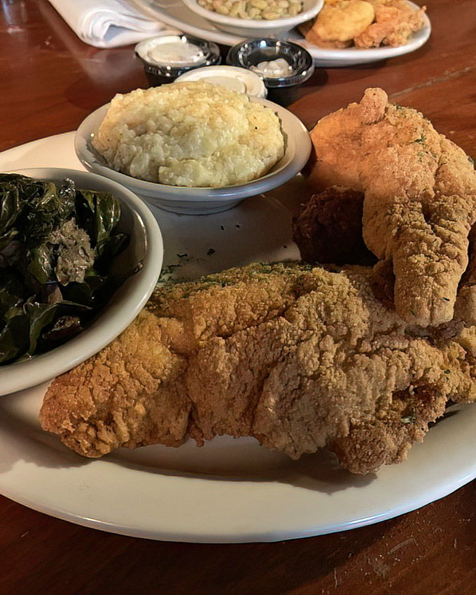 This plate of Southern comfort food with crispy fried chicken, mashed potatoes and collard greens isn't just a meal&mdash;it's a warm hug from your grandmother's kitchen.