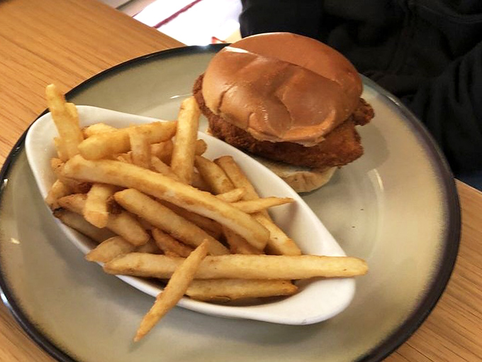 A chicken sandwich that doesn't need a social media manager &ndash; just honest fried goodness on a bun with perfectly crisp fries.