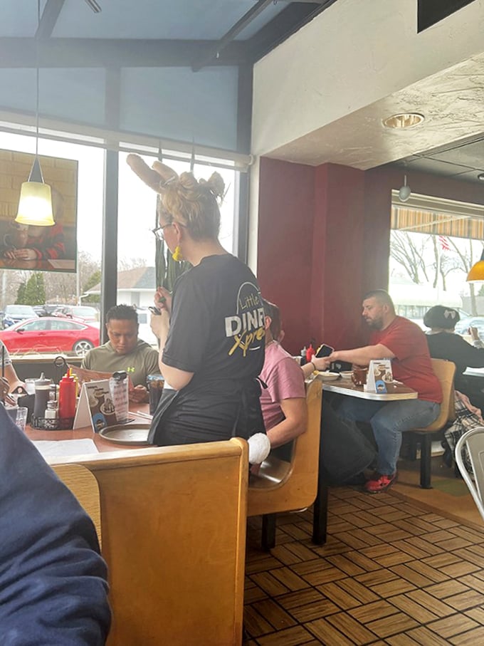 Servers sporting bunny ears bring an unexpected touch of whimsy to your breakfast experience &ndash; Easter spirit or everyday magic? Either way, the coffee keeps flowing.