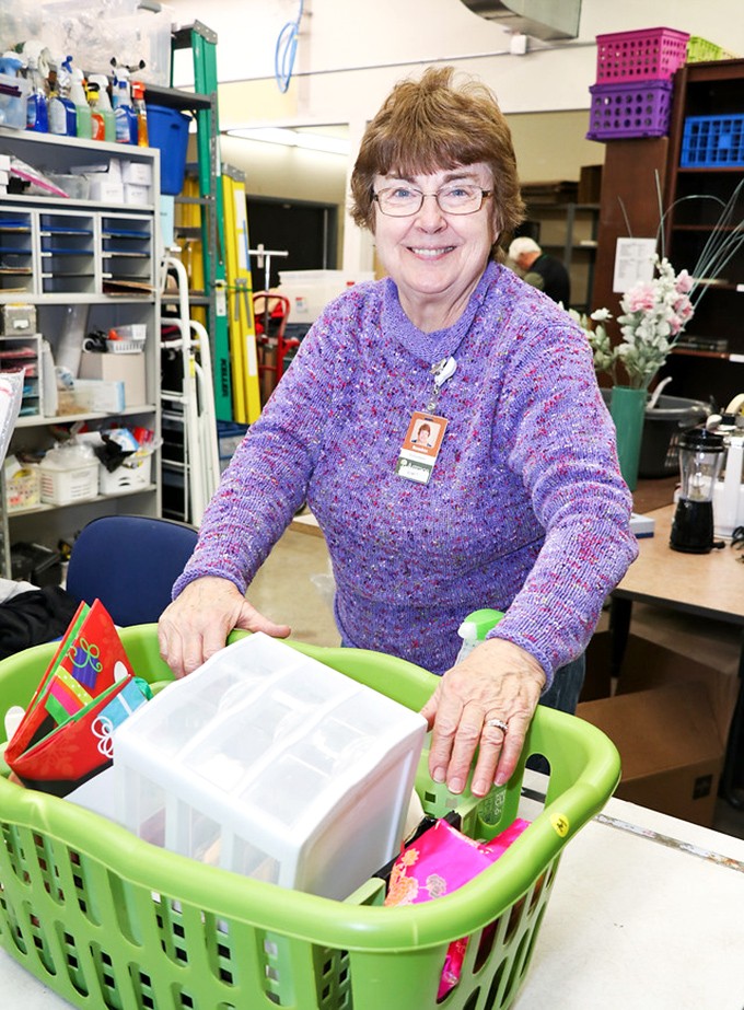 The unsung heroes behind the bargains. Dedicated volunteers transform donations into displays, creating order from chaos with sorting expertise and warm smiles.