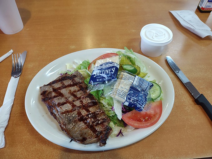 This perfectly grilled steak with its crosshatch marks proves Old Time Drive In isn't just about burgers&mdash;it's about doing the classics right, every time.