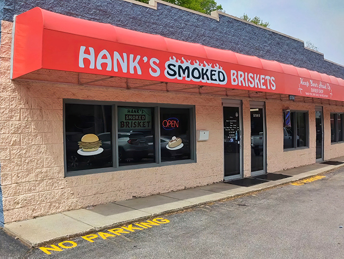 The storefront in daylight reveals its unassuming character – like finding out your mild-mannered neighbor is secretly a barbecue superhero.