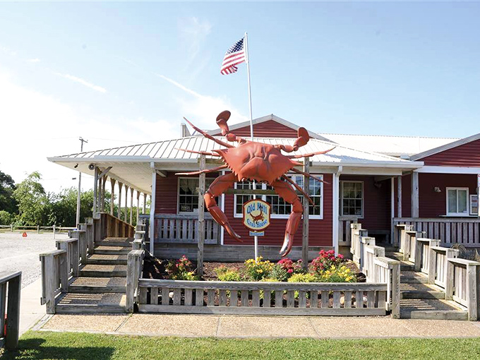 That giant red crab guarding the entrance isn't just decoration&mdash;it's the unofficial mayor of Delmar, welcoming hungry pilgrims to seafood paradise.