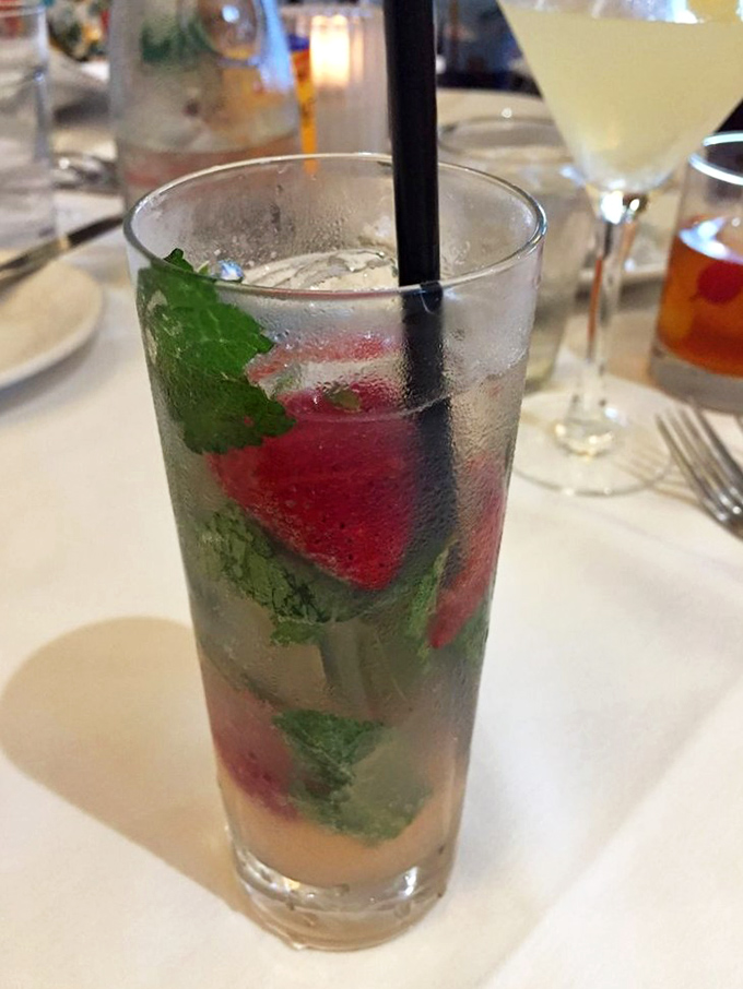 A strawberry mojito that's basically summer in a glass. It's five o'clock somewhere, and that somewhere is right here.