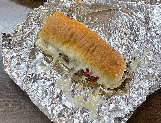 A stromboli that's practically bursting with cheese-pull potential. The kind of handheld meal that requires at least three napkins and zero regrets.