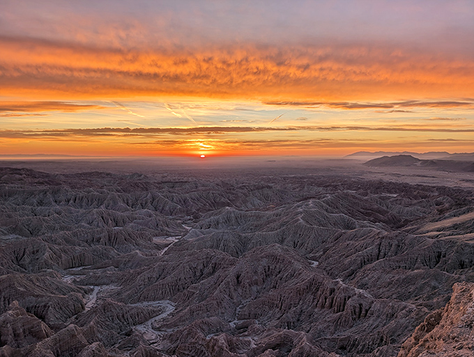 Nature's grand finale &ndash; a sunset over the badlands paints the sky in impossible colors, turning first-time visitors into lifetime fans.