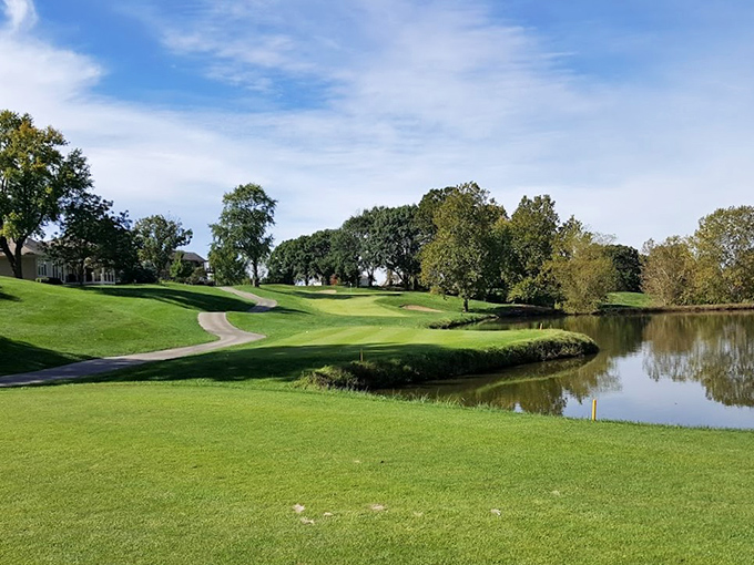 Emerald fairways meeting glassy waters—this golf course doesn't just challenge your swing; it soothes your soul between bogeys.